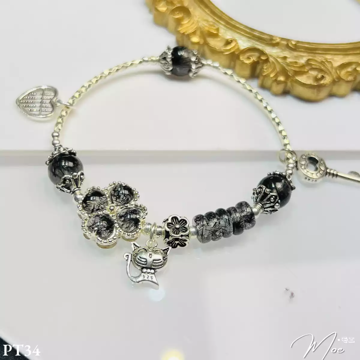 PT34 - Lắc bạc cỏ 4 lá đồng điếu thạch anh tóc đen | trangsucmoe